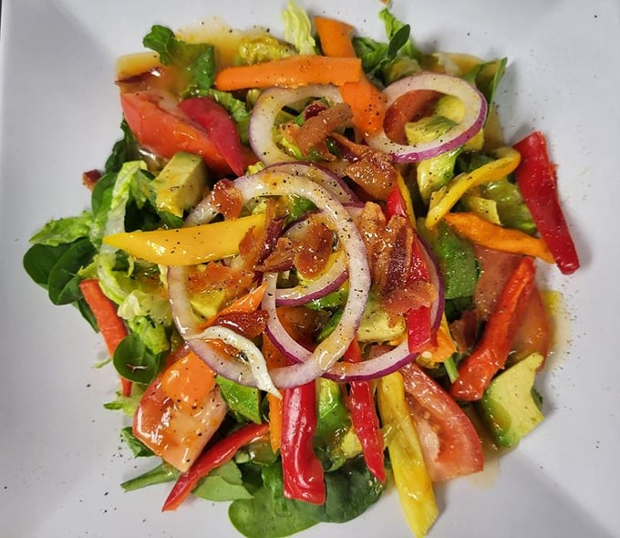 A rainbow of fresh vegetables dancing in perfect harmony. This isn't just a salad—it's summer captured on a plate.