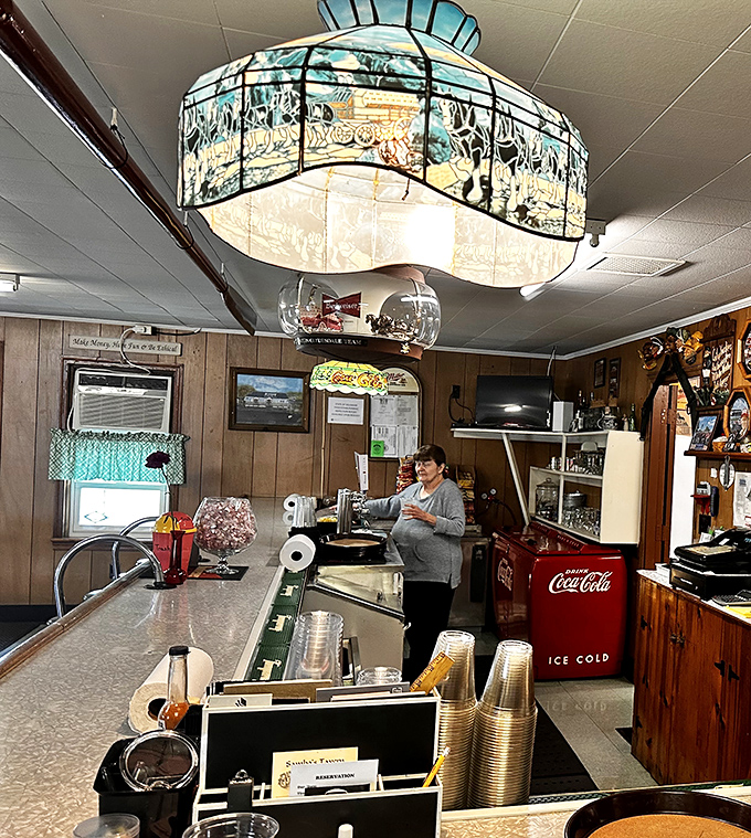 Behind every great seafood joint is a staff who knows the rhythm of hunger and satisfaction. That stained-glass light fixture has illuminated countless happy meals.