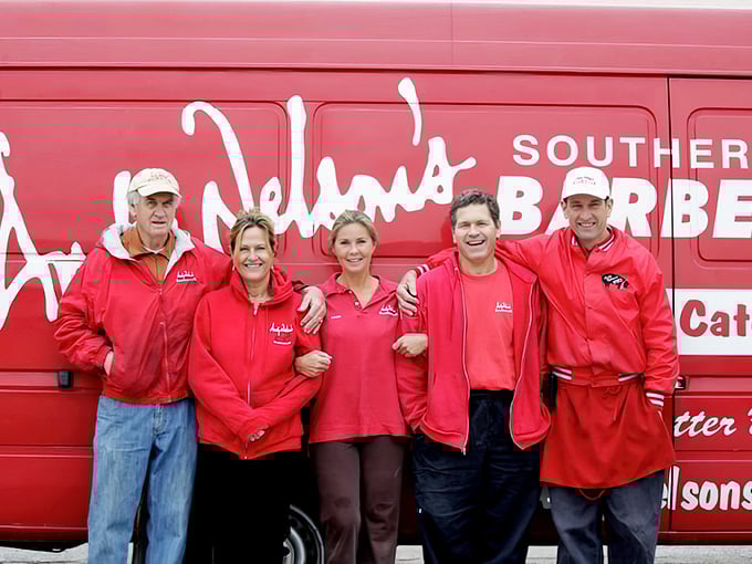 The team behind the smoke, united in red and the sacred mission of bringing proper Southern pit barbecue to grateful Marylanders.