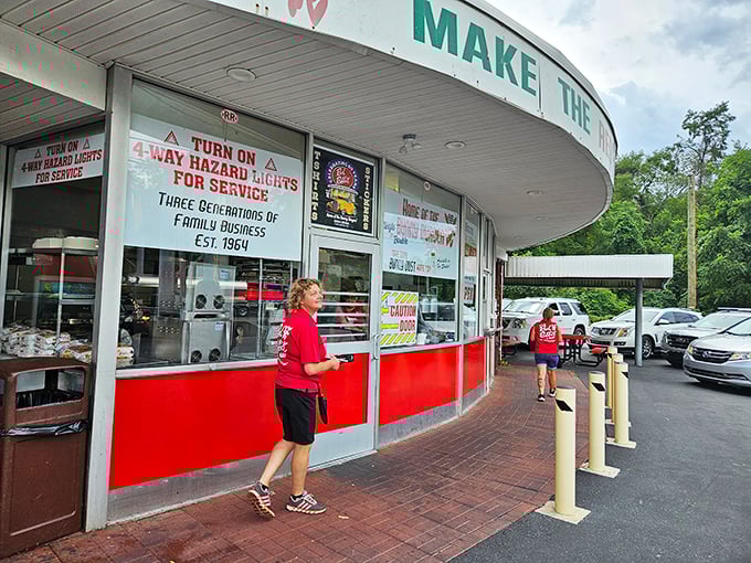 The familiar red shirts of the staff signal you've arrived at a place where tradition matters more than trends.