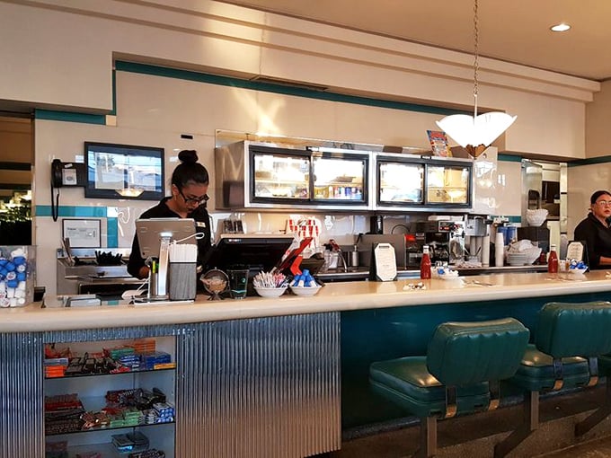 Behind every great diner is a team that keeps the coffee flowing and the grill sizzling. The heart of Horseless Carriage.