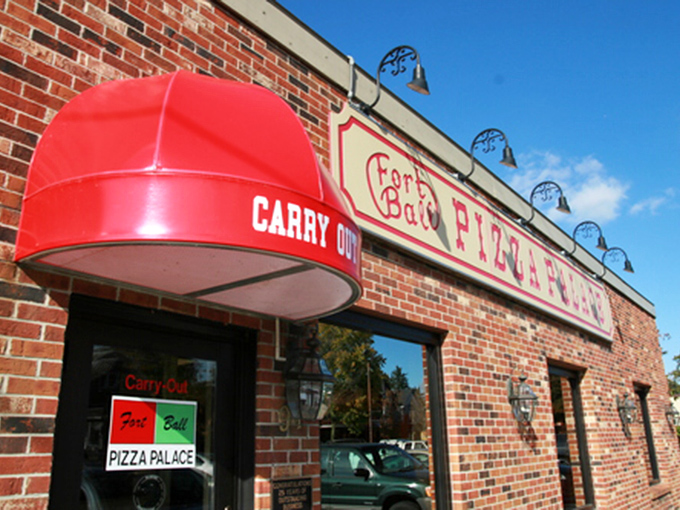 The iconic Fort Ball Pizza Palace sign has been guiding hungry souls to happiness for decades.