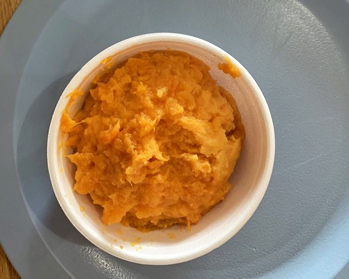 Sweet potato side that deserves its own fan club. This isn't just a vegetable—it's nature's candy after a pitmaster's loving attention.