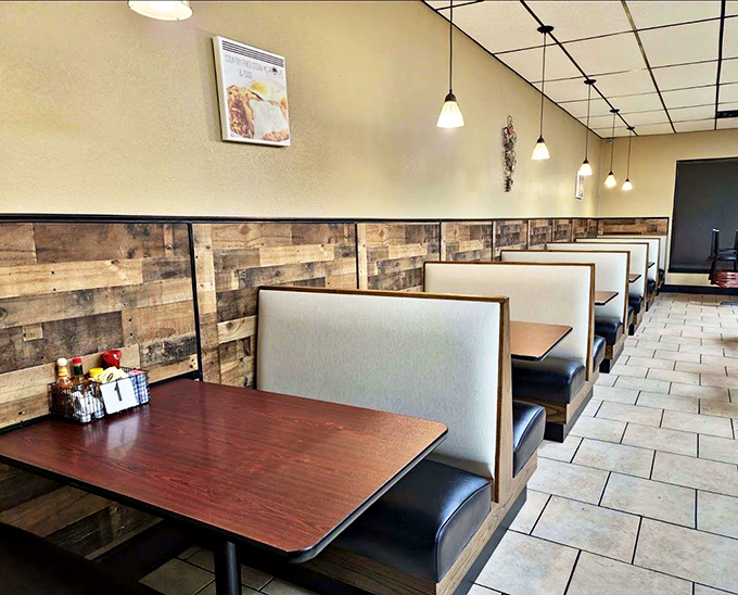 Cozy booths designed for lingering conversations and second helpings. These aren't just seats—they're front-row tickets to the comfort food show.