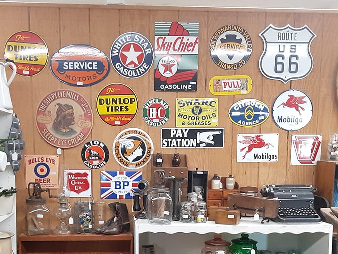 The wall of vintage signs is like social media for previous generations – advertising the brands that fueled America's love affair with the automobile.