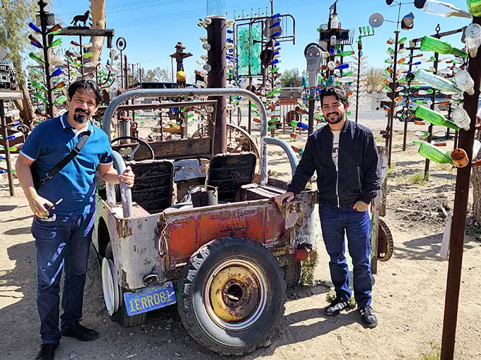 Visitors pose with a weathered vehicle, capturing that perfect "I found something amazing that Instagram doesn't know about yet" moment.