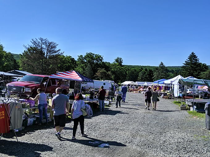 The flea market shuffle—part treasure hunt, part social event. Notice how everyone walks with that "I might find something amazing" posture.