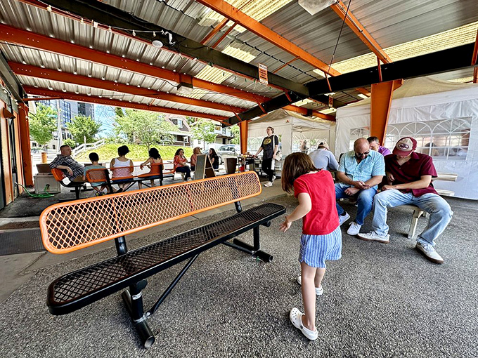 The outdoor waiting area isn't just a place to kill time—it's where anticipation builds and the aroma of burgers makes patience nearly impossible.