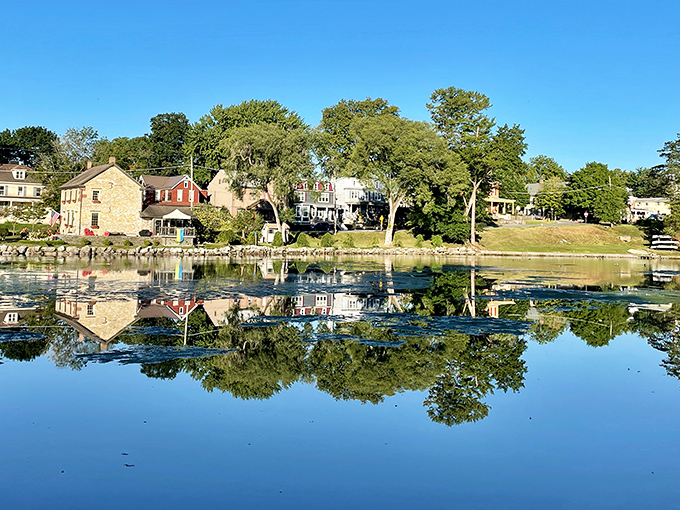 Boiling Springs offers mirror-like reflections on its peaceful lake, doubling the beauty of the historic homes along its shore.