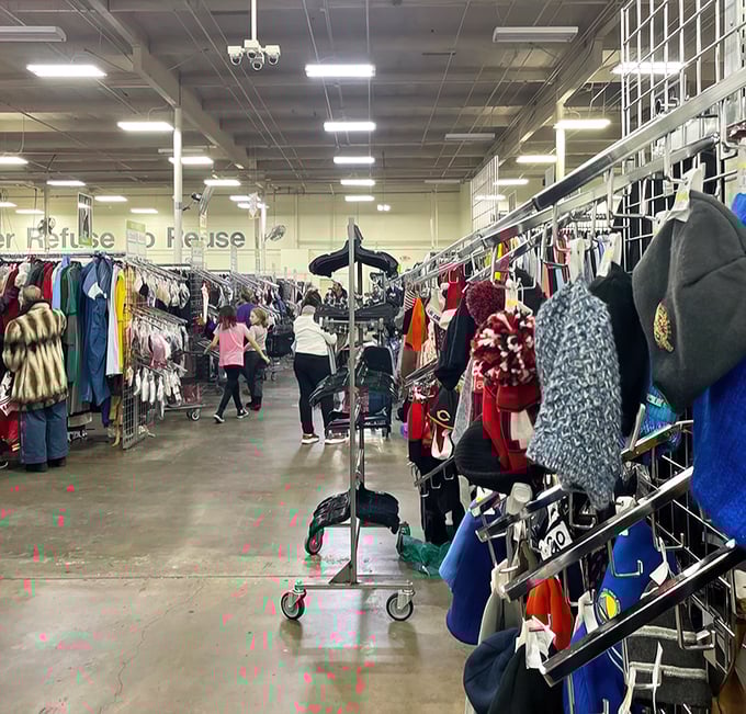 Navigating these aisles is retail archaeology—each rack a different era, each find a small victory against overpriced retail.