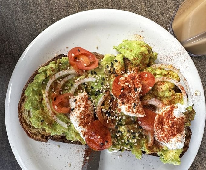 Avocado toast elevated to art form, proving California knows how to make healthy food irresistibly delicious.