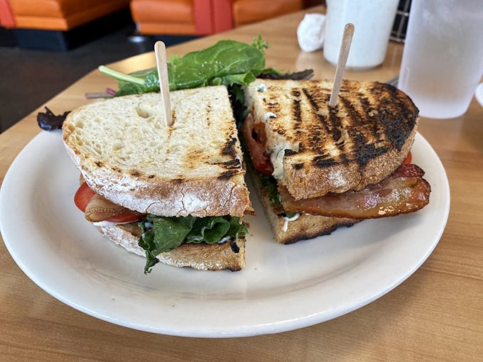 This isn't just a BLT—it's architecture between bread. The perfect ratio of bacon, lettuce and tomato, held together with wooden stakes like a breakfast vampire slayer.