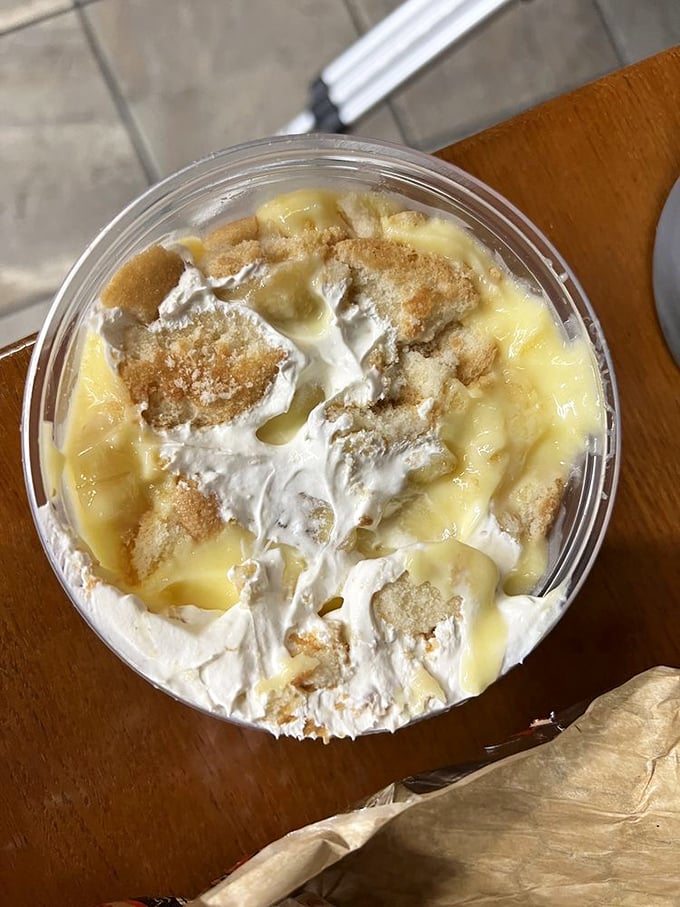 Banana pudding: the sweet, creamy finale to a meat symphony. Those vanilla wafers aren't just floating—they're doing the backstroke in heaven.