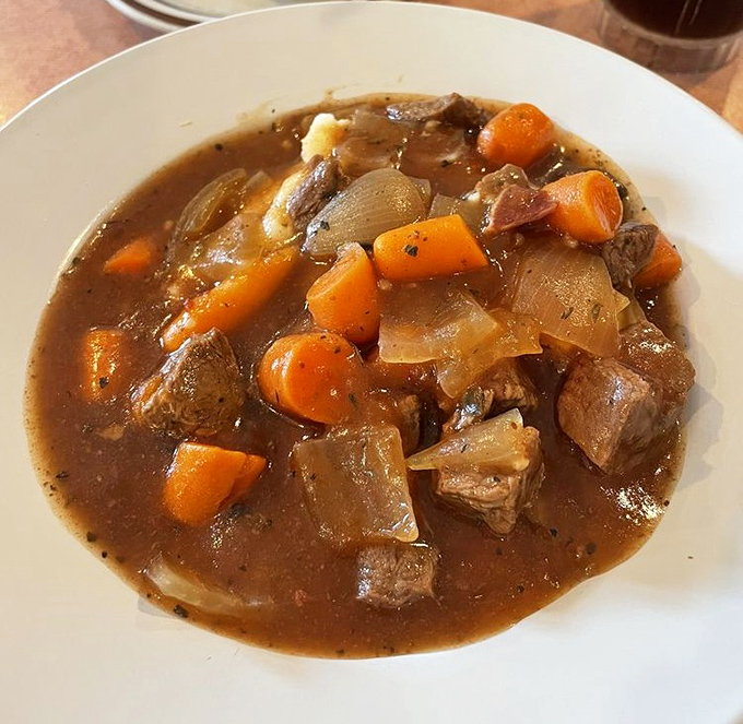 Beef stew that looks like it simmered while three generations of family stories were told around the kitchen. This isn't food; it's time travel in a bowl.