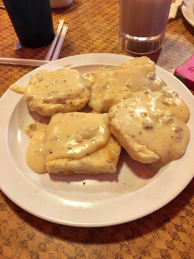 Biscuits and gravy – the breakfast that says, "Go back to bed afterward." This plate contains more comfort than a therapy session and a warm blanket combined.