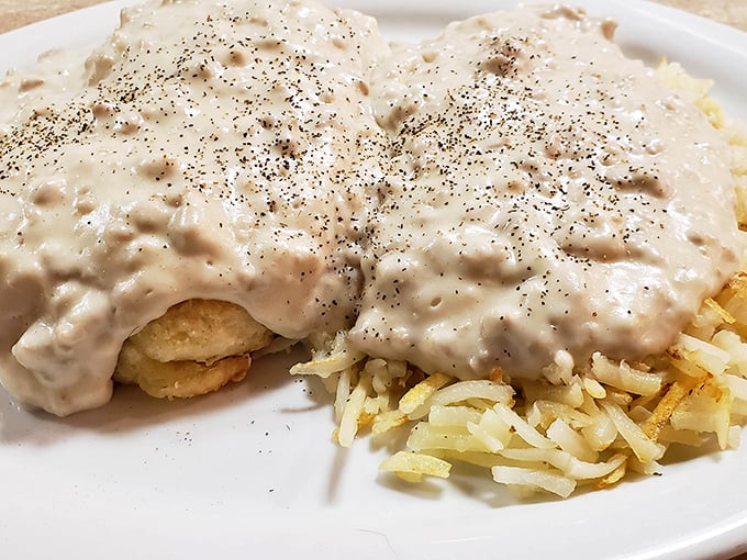 Biscuits and gravy with a side of hash browns – the breakfast of champions who plan to nap by noon. Pure, unapologetic comfort on a plate.