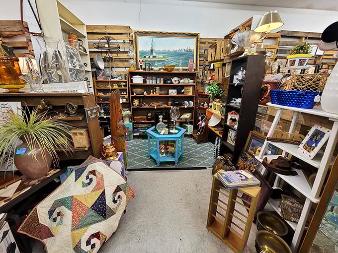 Each booth creates its own little world of curated treasures. That turquoise table pops against wooden shelves laden with maritime memories and vintage glassware