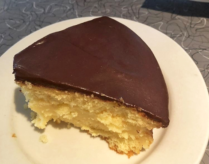 Boston cream pie that bridges the gap between cake and custard. The chocolate top layer seals the deal on this slice of sweet nostalgia.