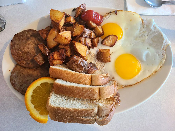 The breakfast platter that answers the eternal question: "Why choose one breakfast food when you can have them all?" Sunny-side perfection on a plate.
