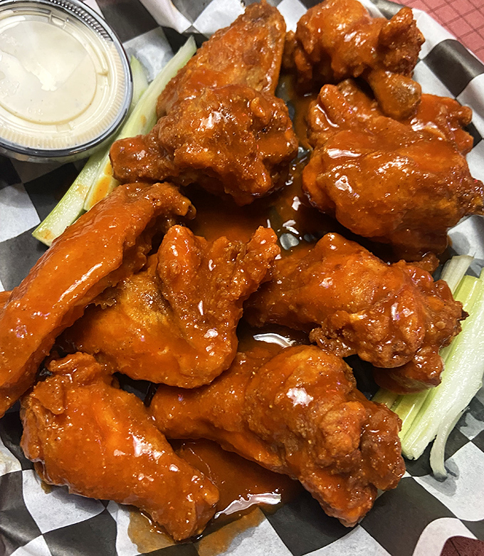 Buffalo wings with attitude—saucy, spicy, and unapologetically messy. Your shirt may not survive, but your taste buds will thank you.