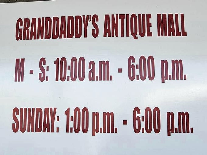 The hours of operation, clearly stated in no-nonsense burgundy. Eight hours daily to lose yourself in yesterday's treasures – plan accordingly!