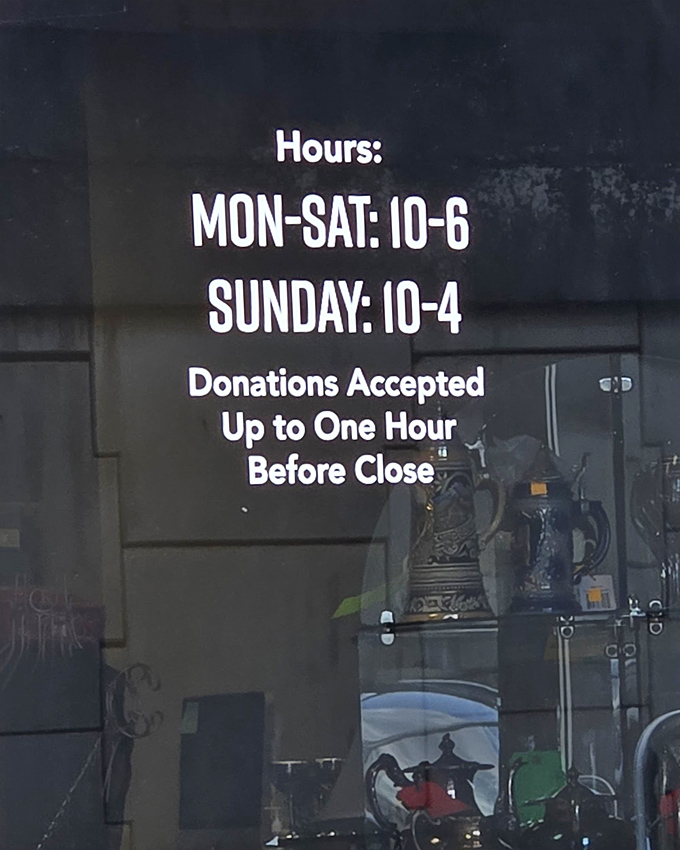 The hours sign is like a treasure map with clear instructions. Donations accepted until one hour before close—keeping the cycle of giving spinning.