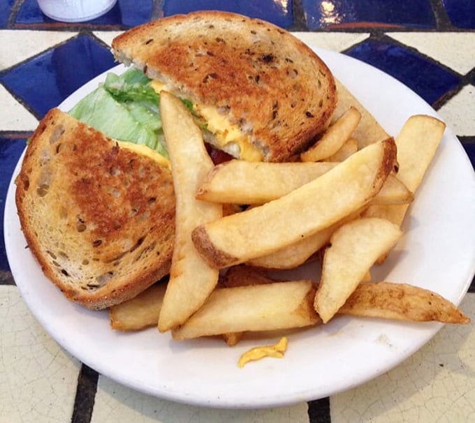 This sandwich isn't playing games—golden-grilled bread, melty cheese, and crisp fries make for the lunch equivalent of winning the lottery.