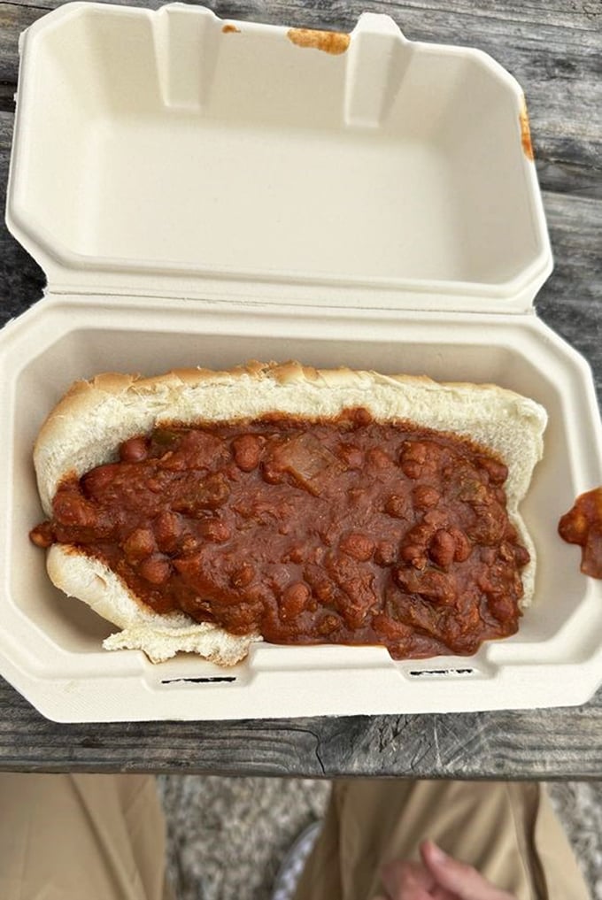 Chili dogs may not be sophisticated cuisine, but they speak a universal language that translates to "affordable happiness in a foam container."