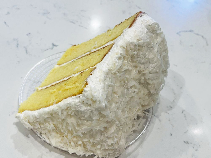 This coconut cake doesn't just have a snow-capped appearance—it's an avalanche of flavor. Three perfect layers of sunshine-yellow cake embraced by clouds of coconut frosting.