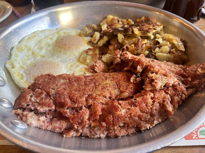 Corned beef hash with that perfect crust that only comes from a well-seasoned griddle and decades of breakfast wisdom.