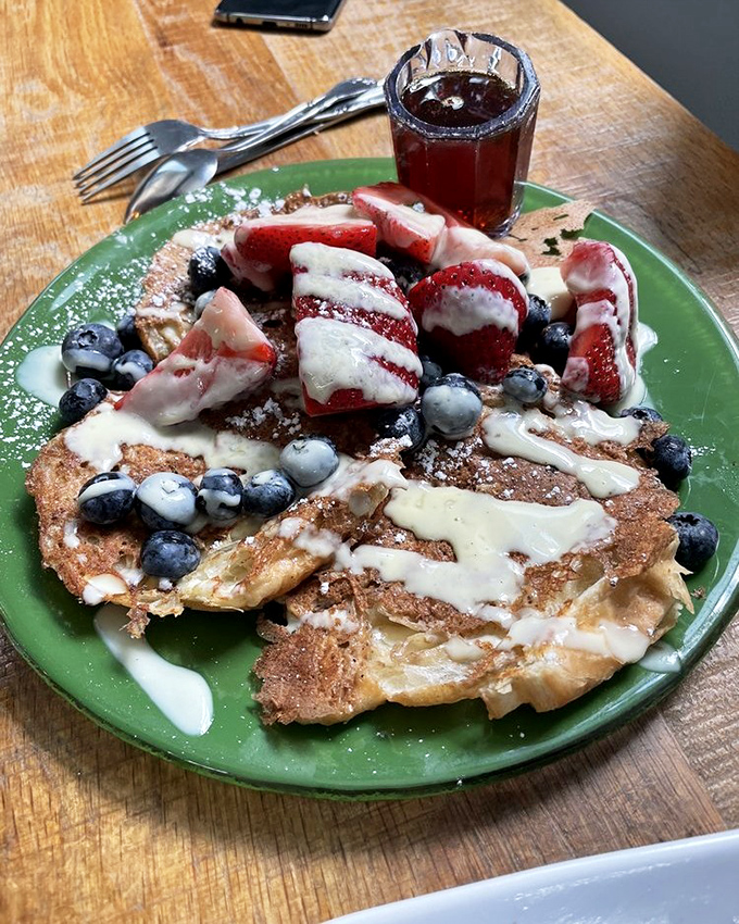 French toast that's having an identity crisis as a berry parfait—and creating a breakfast masterpiece in the process.
