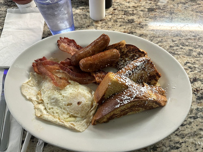 The Daddypops Duo plate proves breakfast is the one meal where sweet and savory aren't competitors—they're perfect companions.