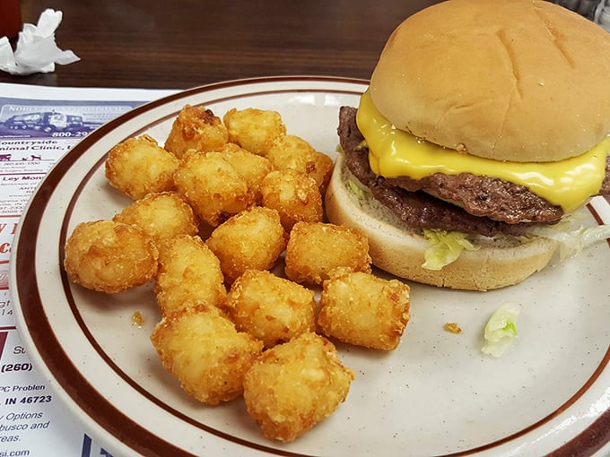 The cheeseburger and tots—America's power couple. No food stylist needed when honest-to-goodness deliciousness is the only filter that matters.