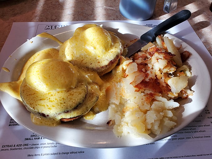 Eggs Benedict: the breakfast that says "I'm fancy but approachable," with hollandaise sauce flowing like liquid sunshine.