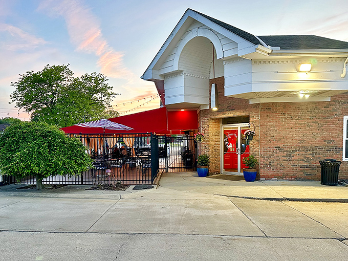 As evening falls, The Lobster Pot's patio beckons with the promise of al fresco dining. Those string lights aren't just illumination—they're atmosphere.
