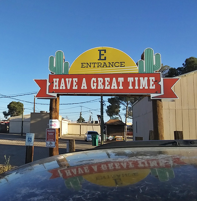The entrance sign says it all—two cacti and a cheerful message welcoming you to a desert shopping adventure that promises treasures beyond the ordinary mall experience.