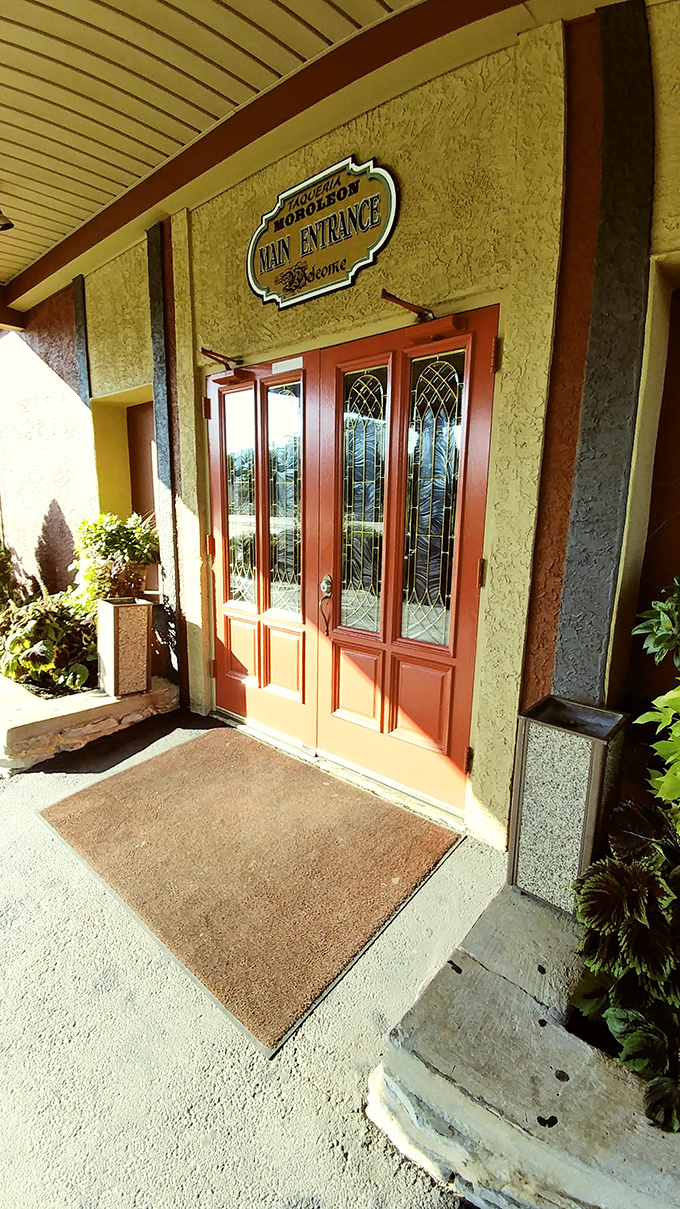 The entrance beckons with its elegant wooden doors and "Main Entrance" sign—a portal to flavors that will transport you far beyond Pennsylvania.