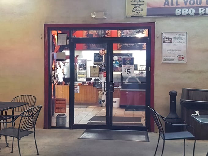 The entrance to meat paradise, complete with a Monday night all-you-can-eat buffet sign that's basically a written permission slip for gluttony.
