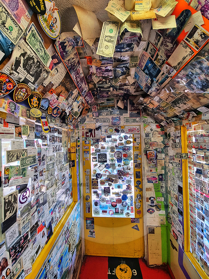 This hallway of memories isn't just covered in dollar bills and photos—it's papered with the happiness of travelers who came before you.