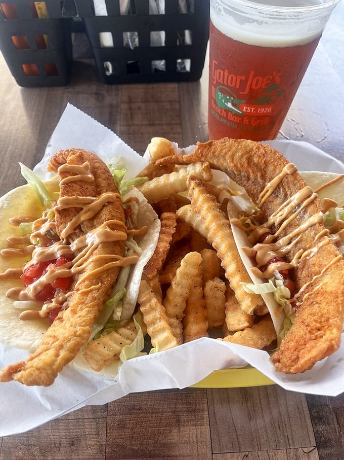 Fish tacos that tell a delicious story. Crispy fillets nestled in soft tortillas with creamy sauce – handheld happiness that captures Florida's coastal spirit.