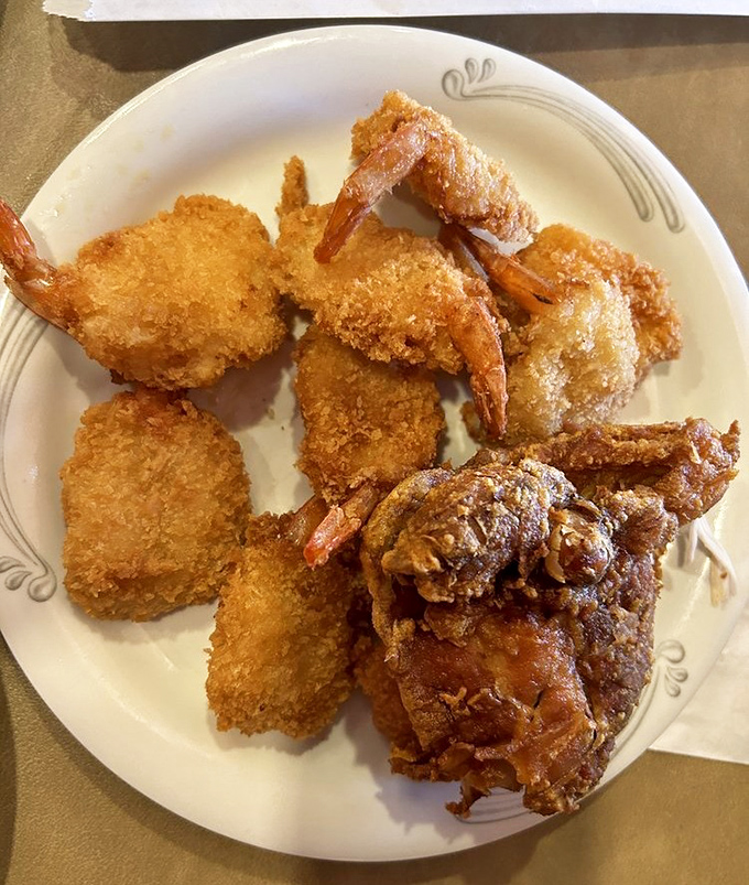 A plate that says "I came here with a plan and executed it flawlessly." Surf and turf, buffet-style—the strategy of champions.