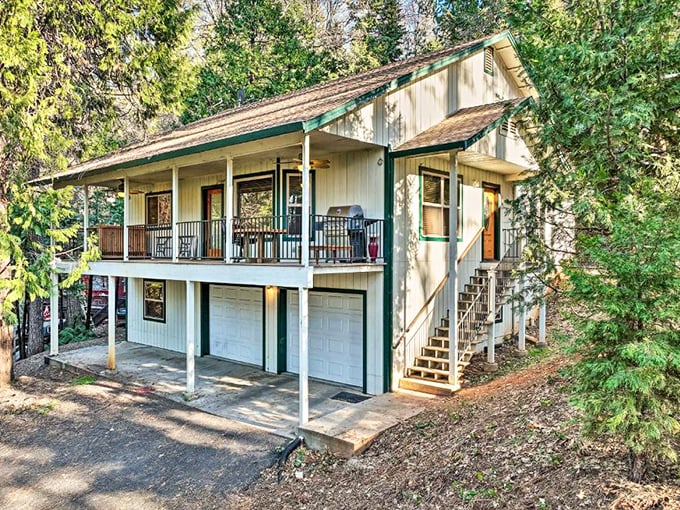The quintessential Twain Harte cabin experience – where porch sitting qualifies as a legitimate vacation activity. Coffee optional, relaxation mandatory.