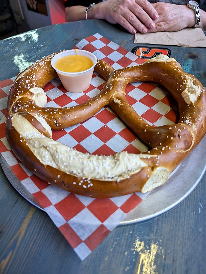 This isn't just a pretzel—it's carb architecture. Warm, soft, and perfectly paired with beer cheese for dipping between sips of cold beer.