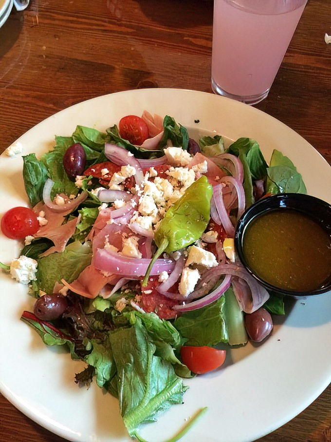 A Greek salad that transports you straight to a seaside taverna—feta, olives, and tomatoes playing their classic roles in perfect harmony.
