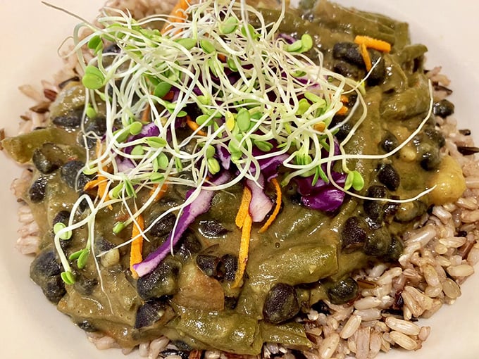 A symphony of textures and colors that would make even devoted carnivores pause. Those sprouts aren't just garnish—they're the culinary equivalent of confetti.