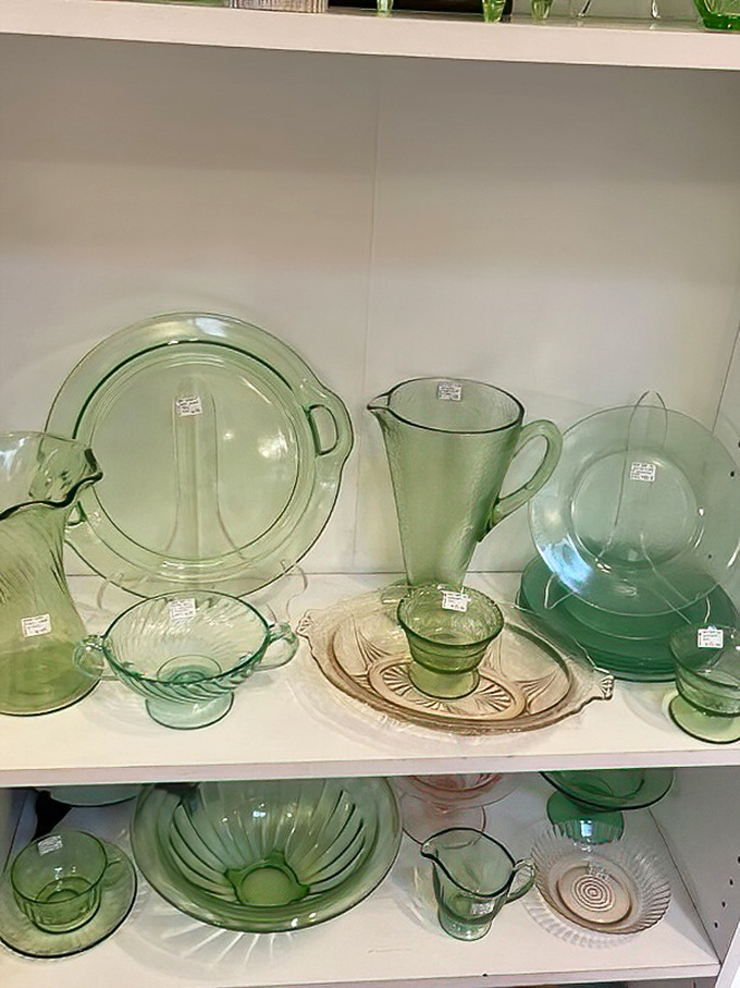 Green glassware catches light like emeralds, proving Depression-era elegance never goes out of style.