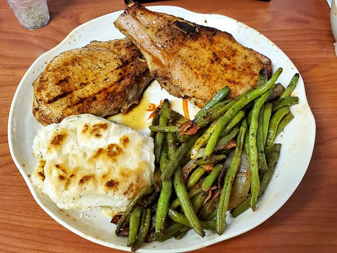 Pork chops with the kind of char that triggers primal happiness. Paired with those green beans, it's the plate that reminds you why simple food matters.