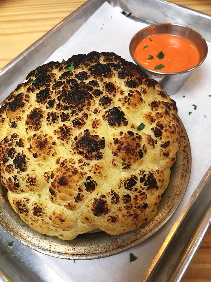 Cauliflower transformed from boring vegetable to rock star. Roasted to caramelized perfection with a sauce worth bottling and selling.