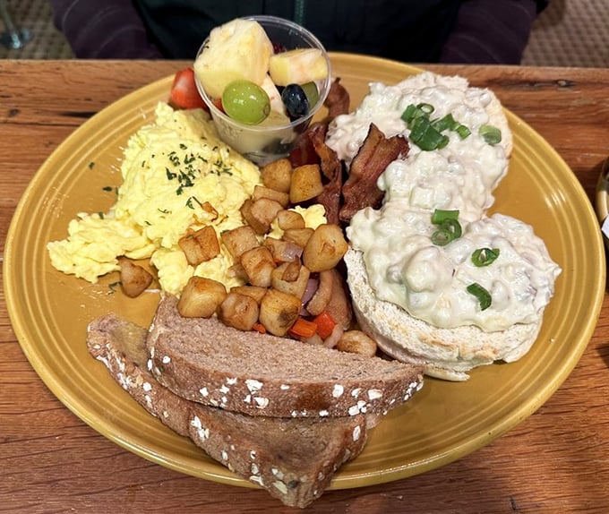 The Hillbilly Breakfast plate proves that morning food knows no time constraints—eggs, potatoes, and biscuits with gravy that would make grandma proud.