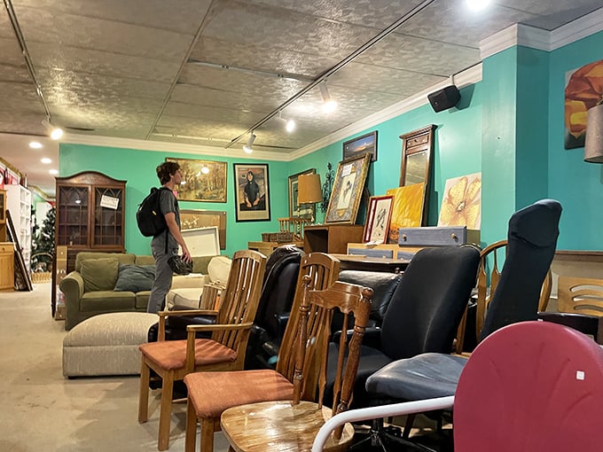 Turquoise walls frame furniture finds while shoppers hunt for that perfect conversation piece.
